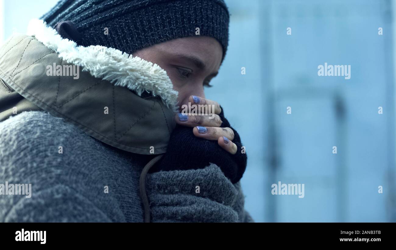 Poor woman in dirty clothes feeling cold, homeless lifestyle ...