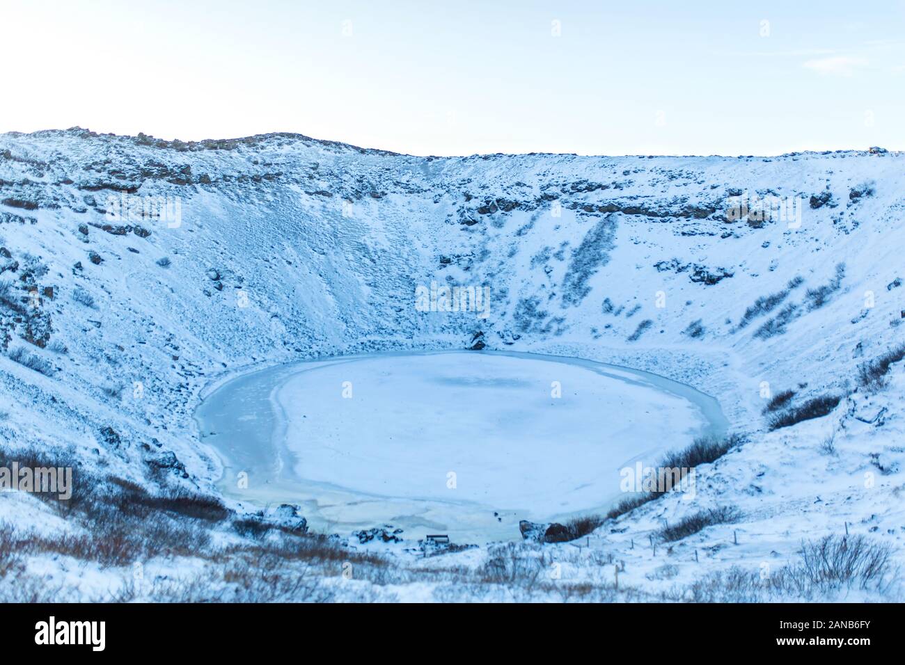 Kerid lake frozen in winter in the crater of an extinct volcano ...