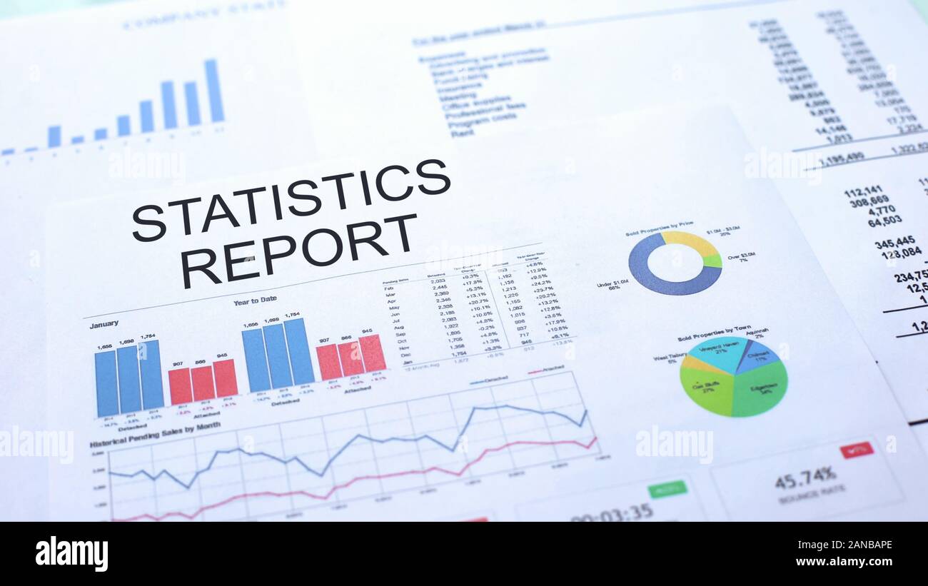 Statistics report lying on table, graphs charts and diagrams, official ...