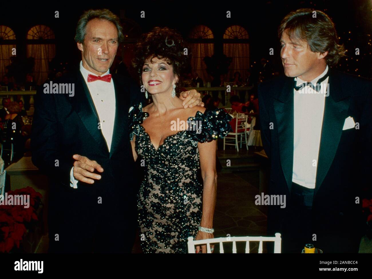 Los Angeles.CA.USA. LIBRARY. Clint Eastwood and Joan Collins with Bill ...