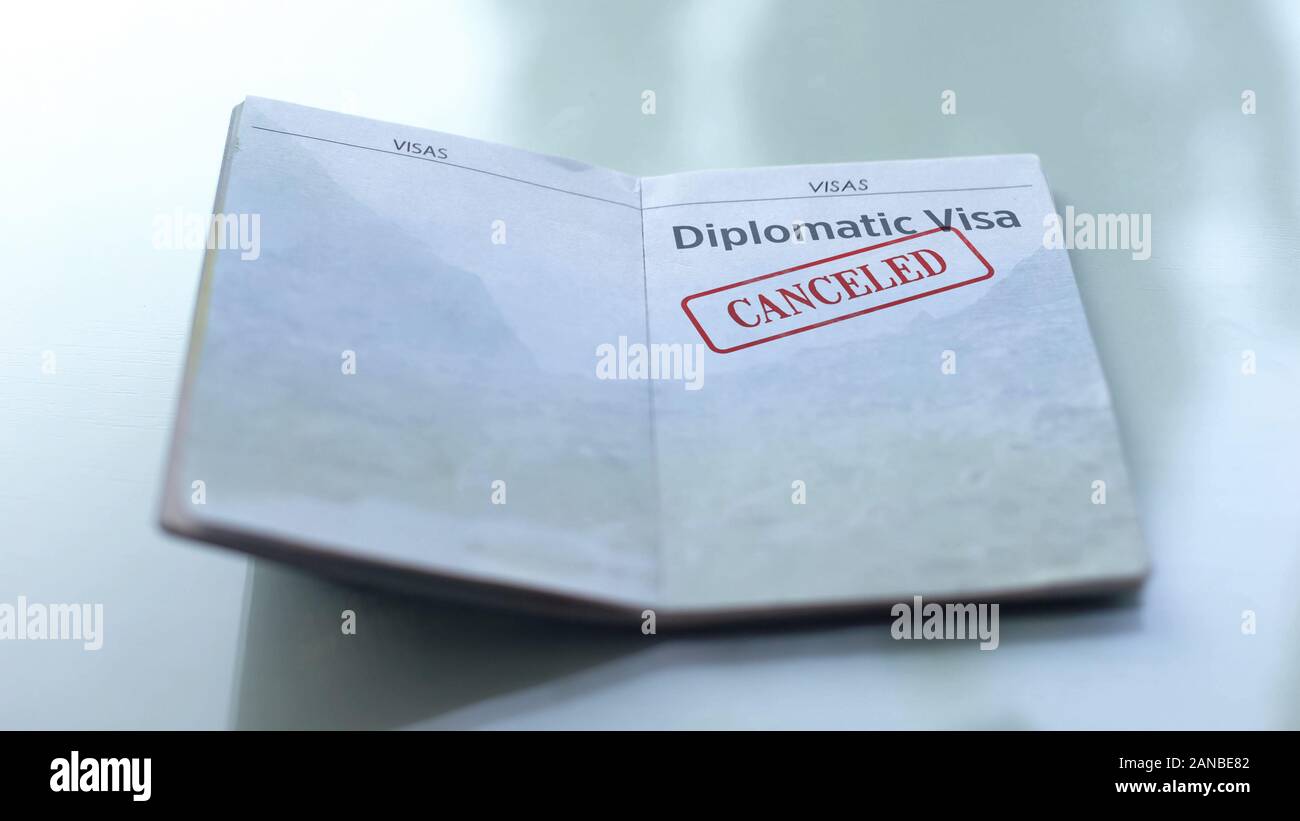 Diplomatic visa canceled, seal stamped in passport, customs office ...