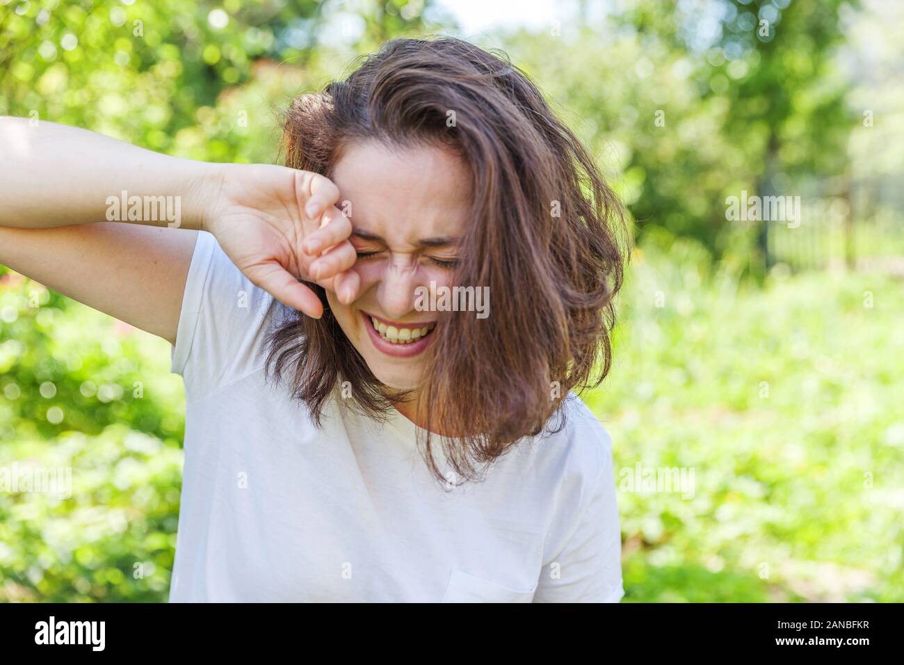 Happy girl smiling outdoor. Beautiful young brunete woman with brown ...