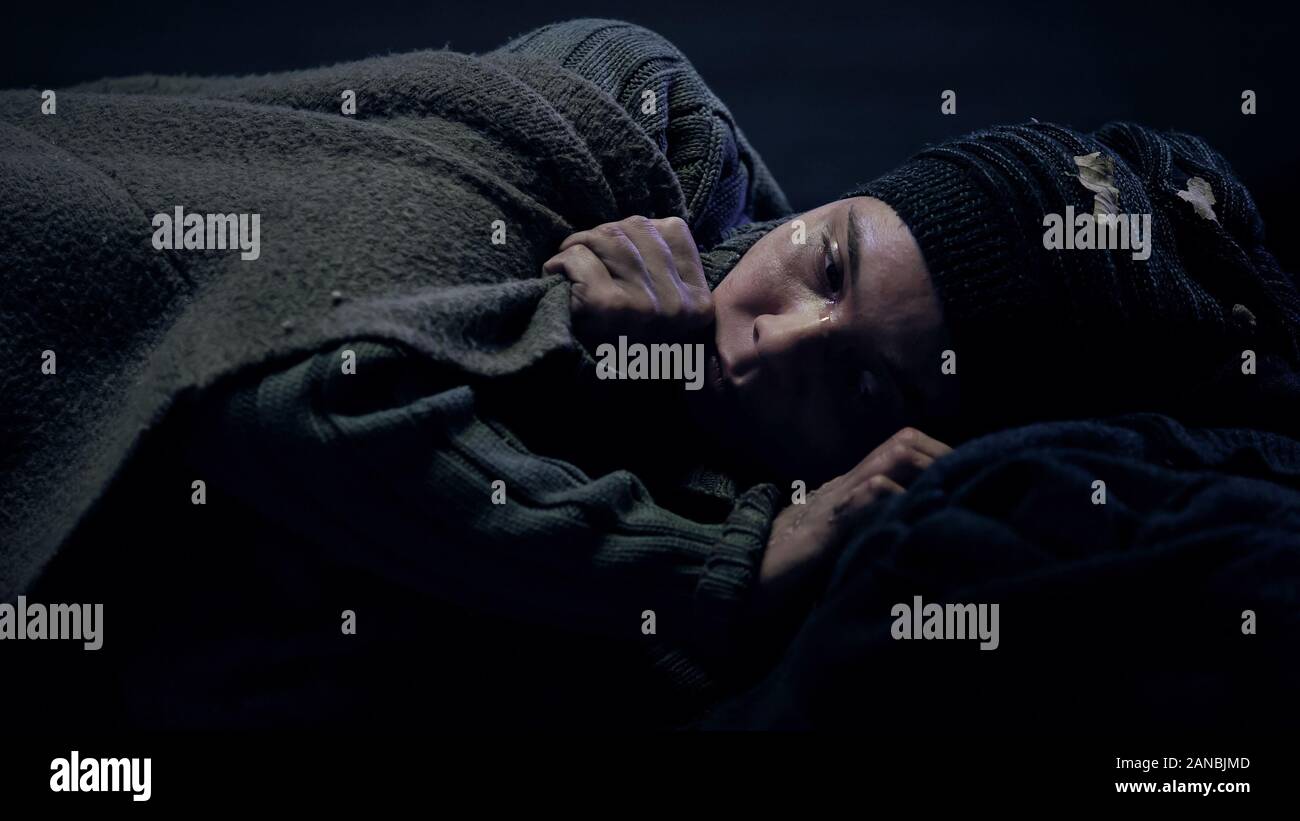 Sad woman crying on street hi-res stock photography and images - Alamy