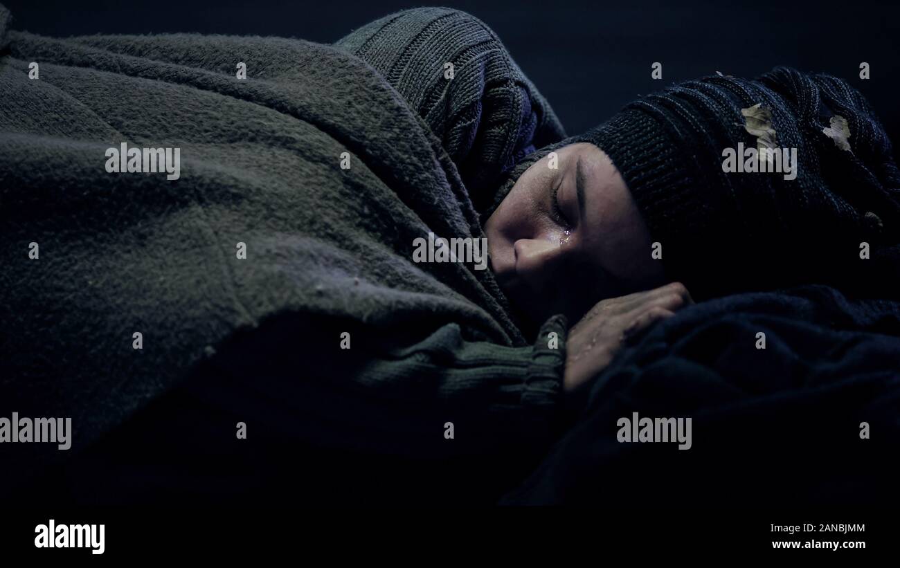 Sad woman crying on street hi-res stock photography and images - Alamy