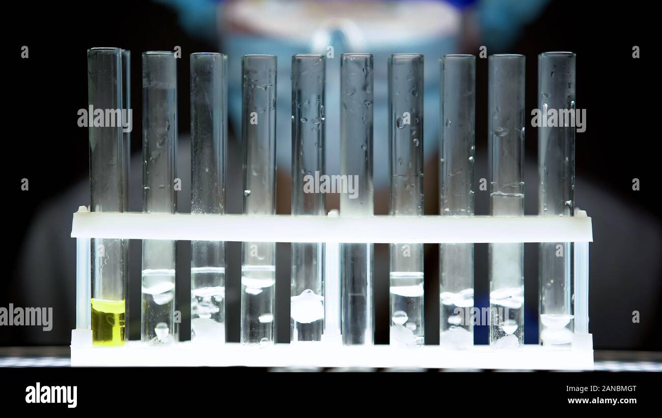 Tubes clear bubbling liquid, pharmaceutical industry, experimental ...