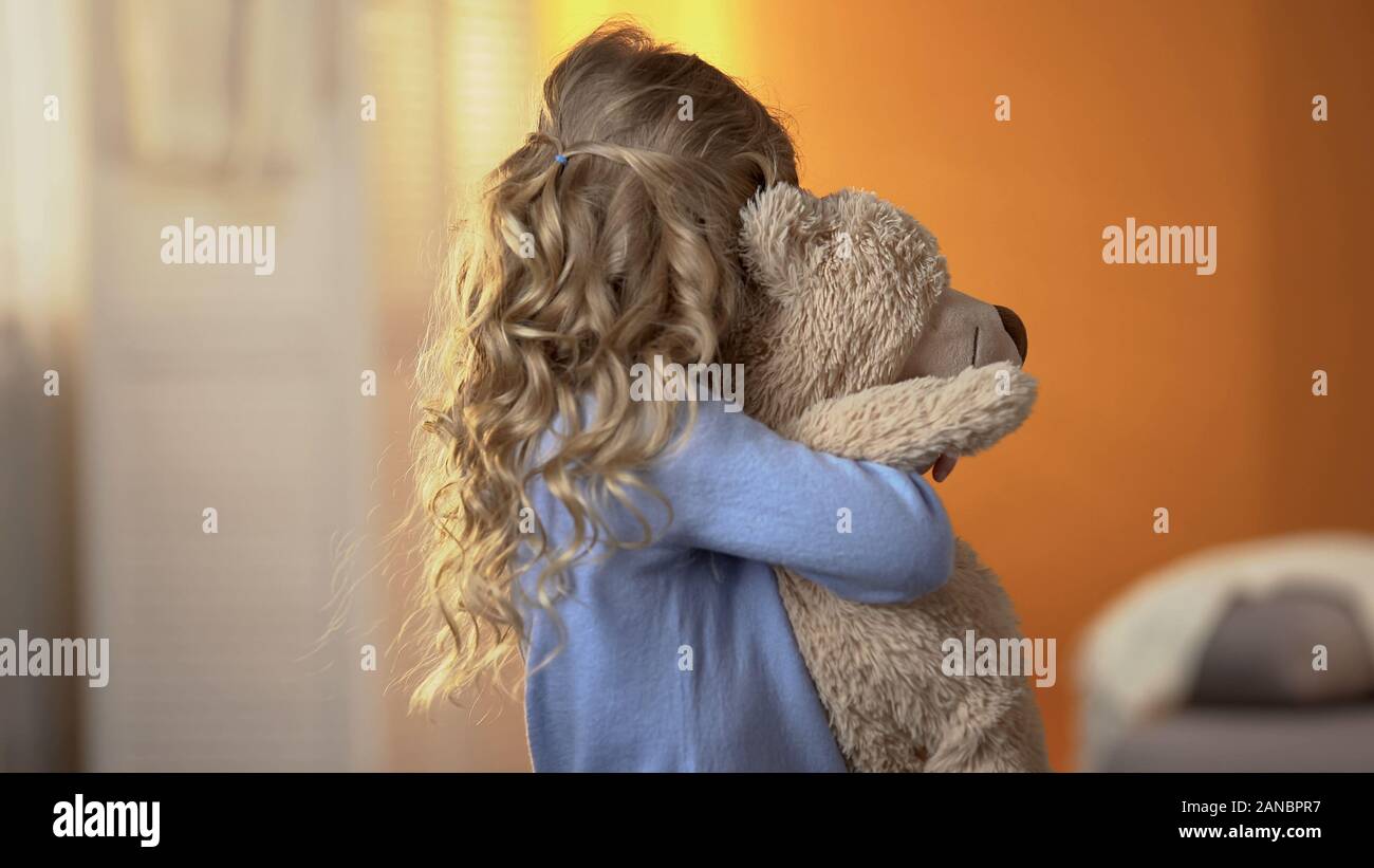 Offended girl hiding from camera, impact of parental quarrels on child ...
