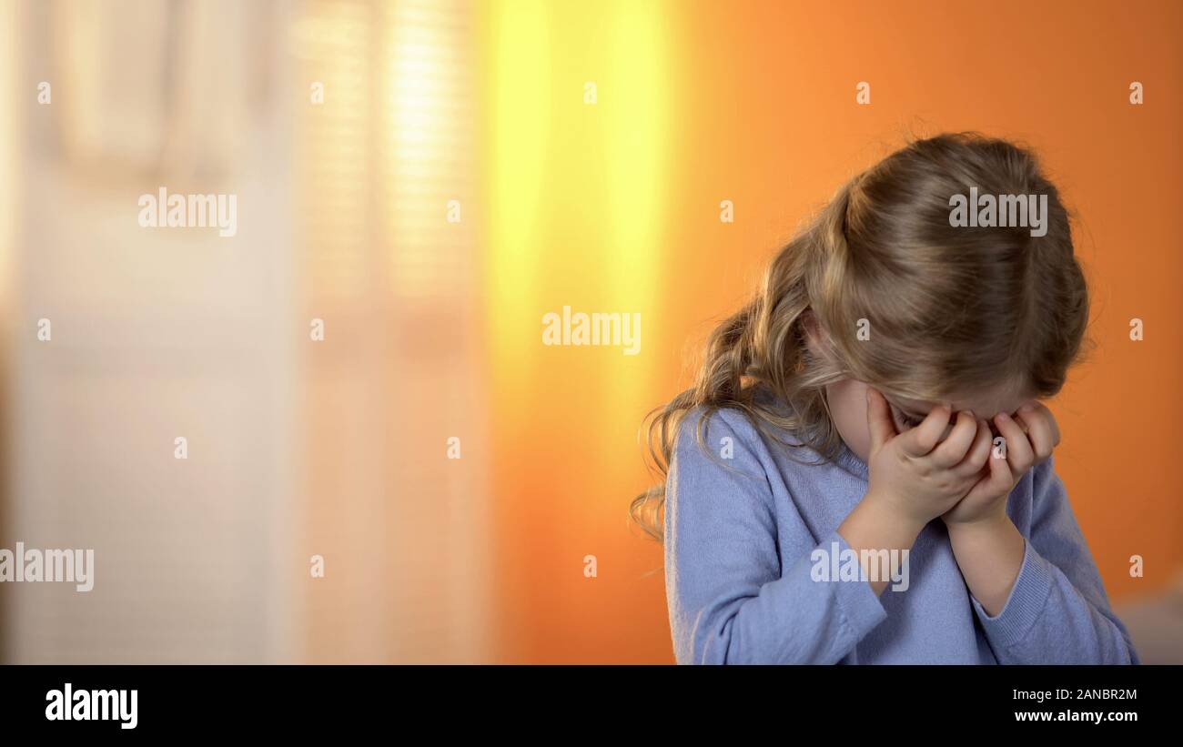 Little sad preschool girl crying having no friends, little orphan ...