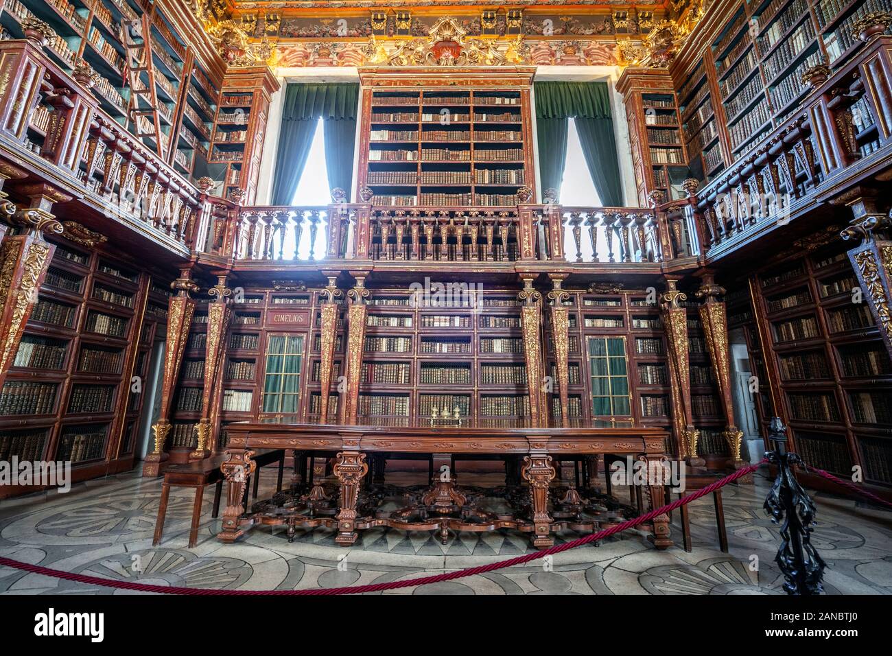 Amazing interioir of library in historic University of Coimbra ...