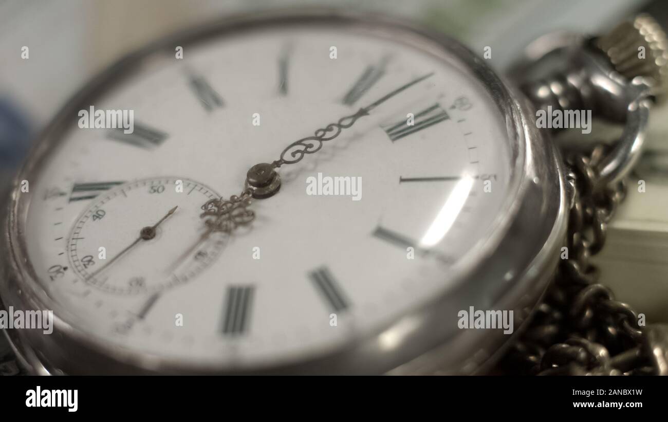 Pocket watch dial close-up, time flying by, history and heritage ...
