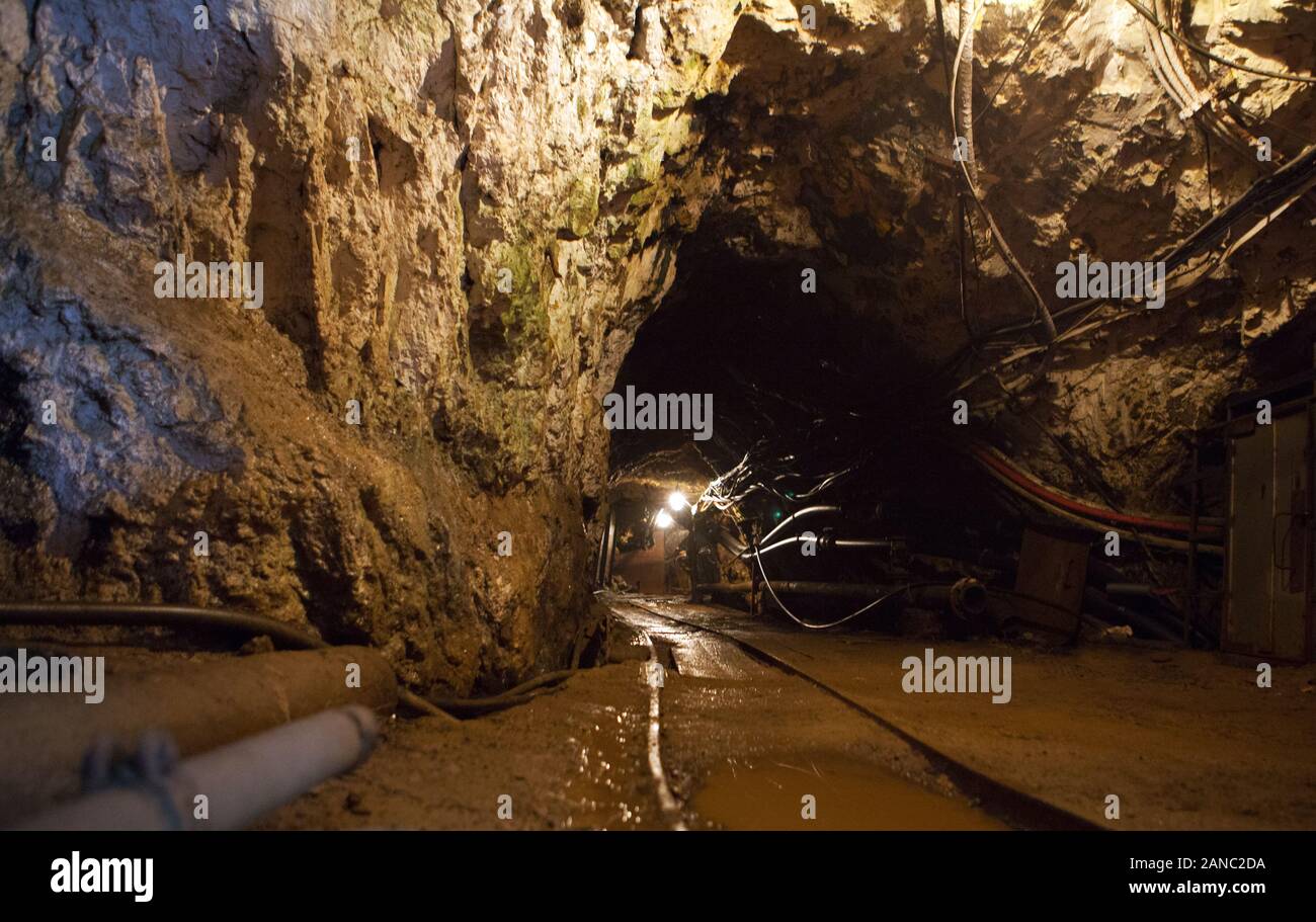 Tunnel with railway and electricity mine cables of underground mining ...