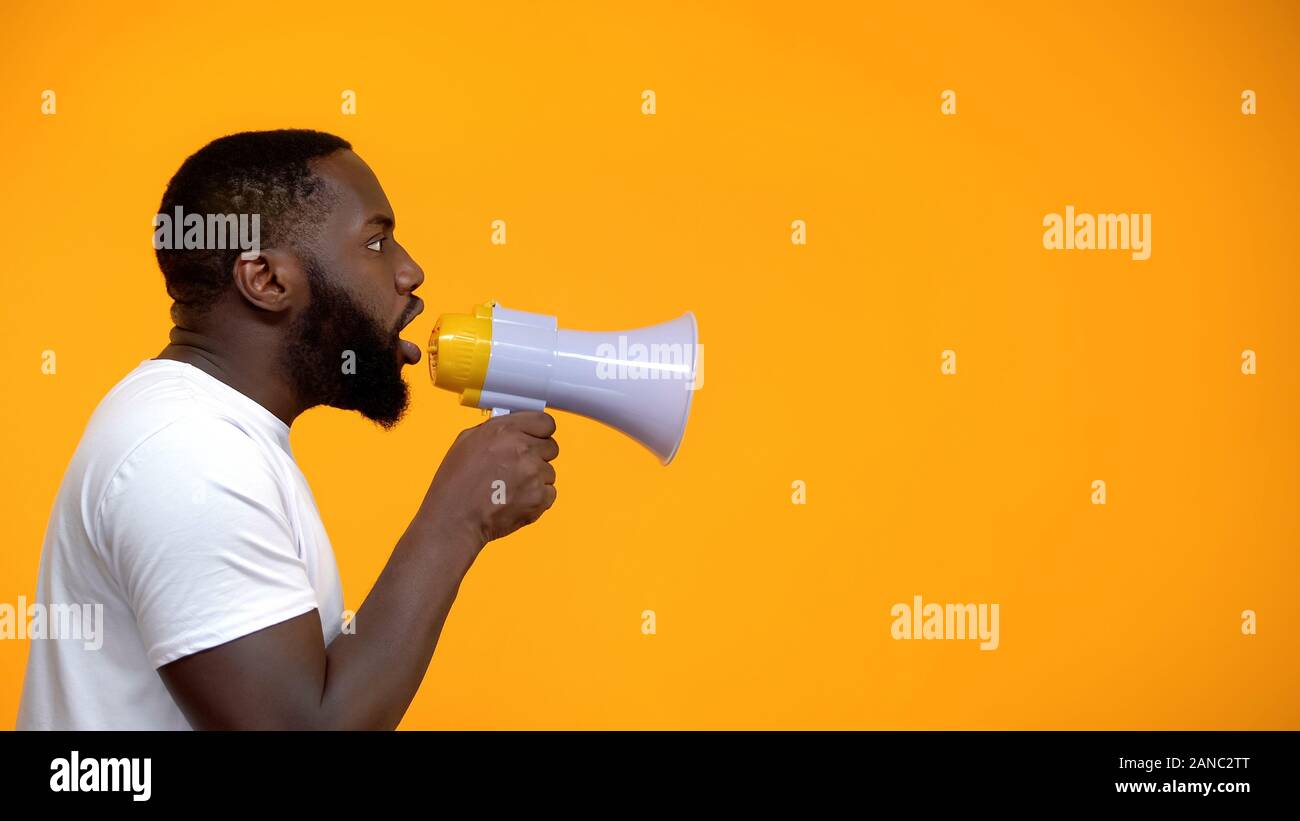 Black man using bullhorn hi-res stock photography and images - Alamy