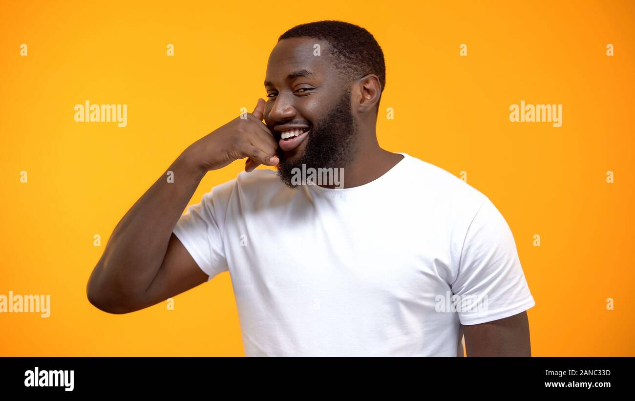 African american man call me sign hi-res stock photography and images ...