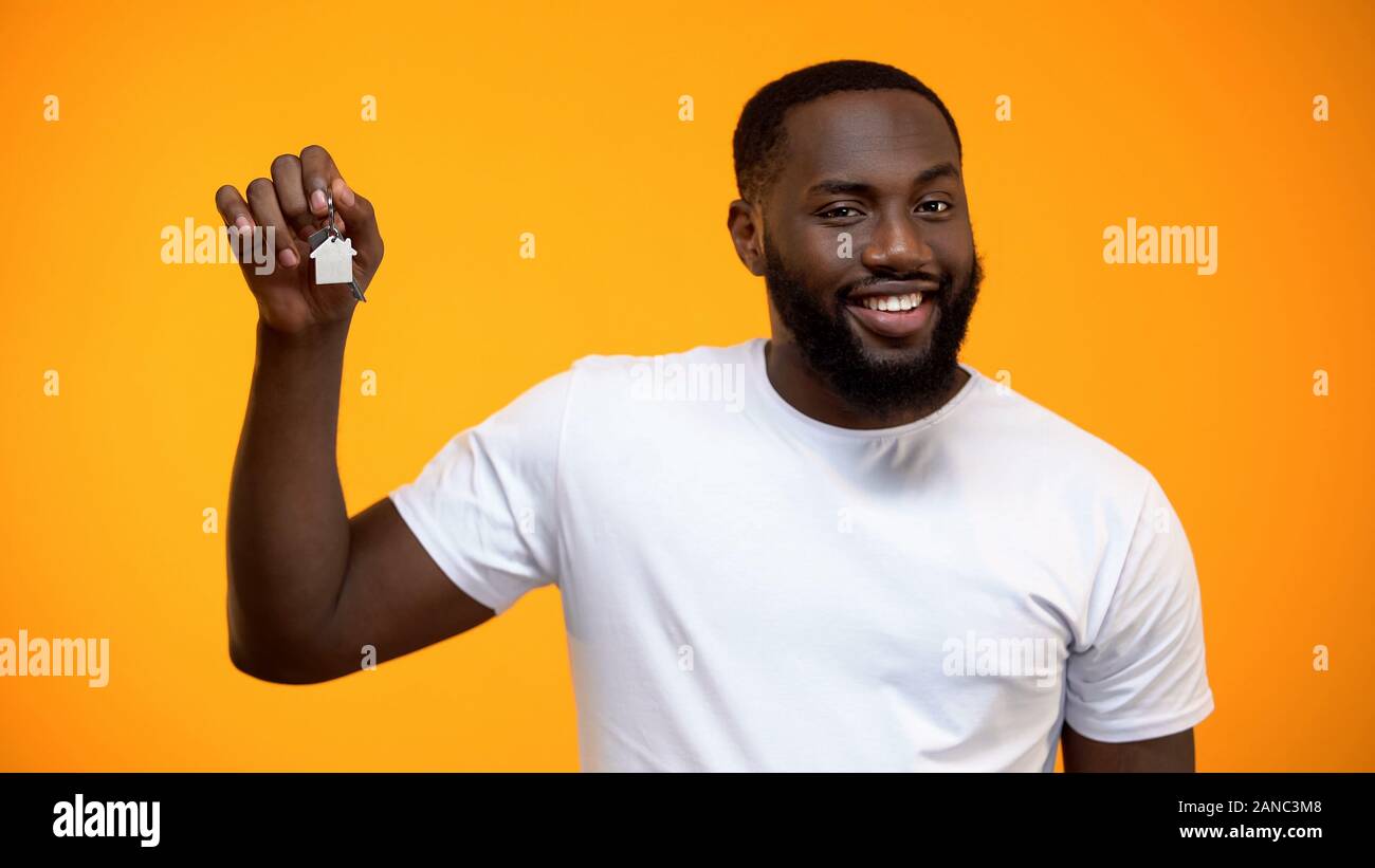 African american hand holding key hi-res stock photography and images ...