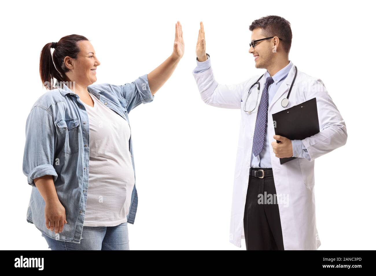 Overweight woman high-fiving a doctor isolated on white background ...