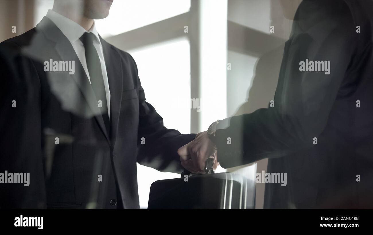 Secret meeting business men hi-res stock photography and images - Alamy