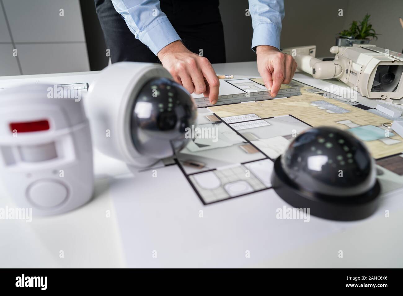 Close-up Of An Architect's Hand Drawing Blueprint With Security ...