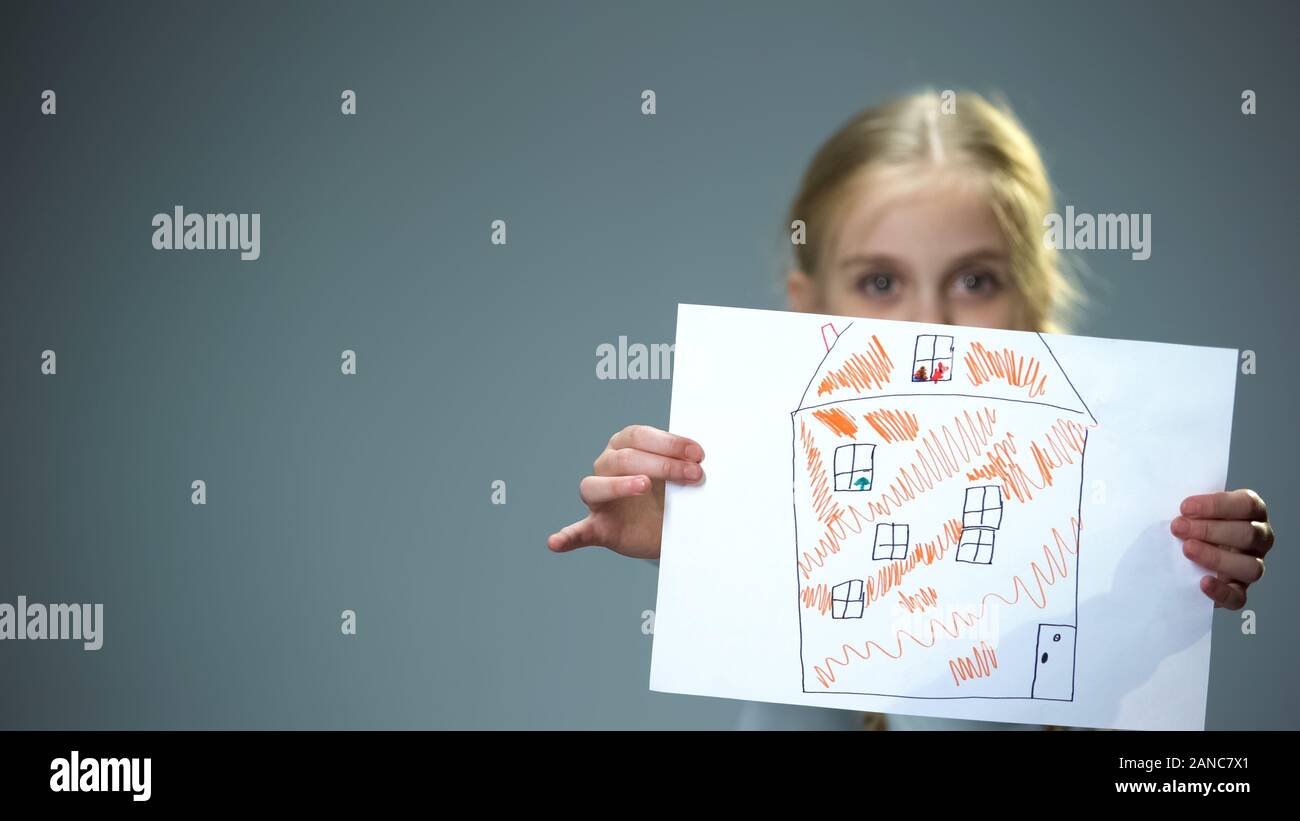 Kid showing house picture into camera, poor family needing home, social ...