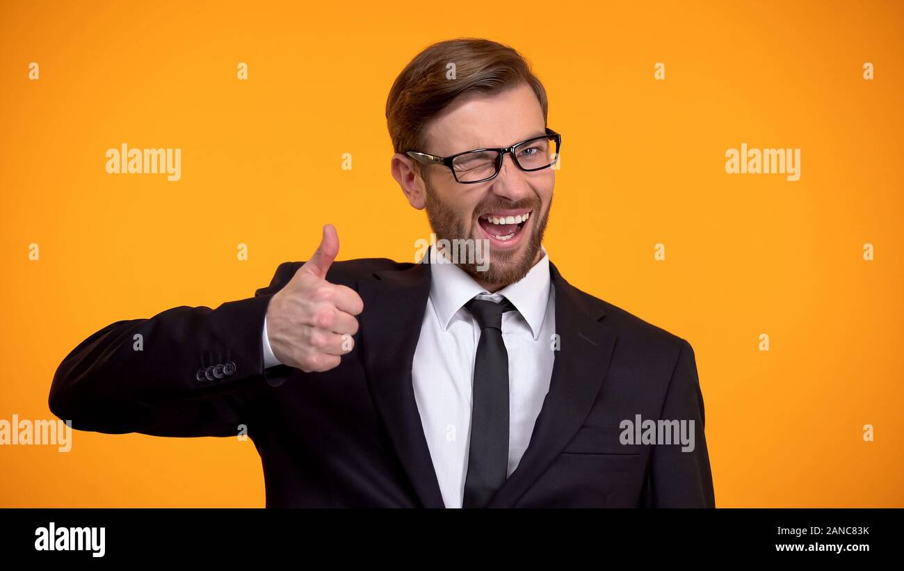 Winking and thumbs up hi-res stock photography and images - Alamy