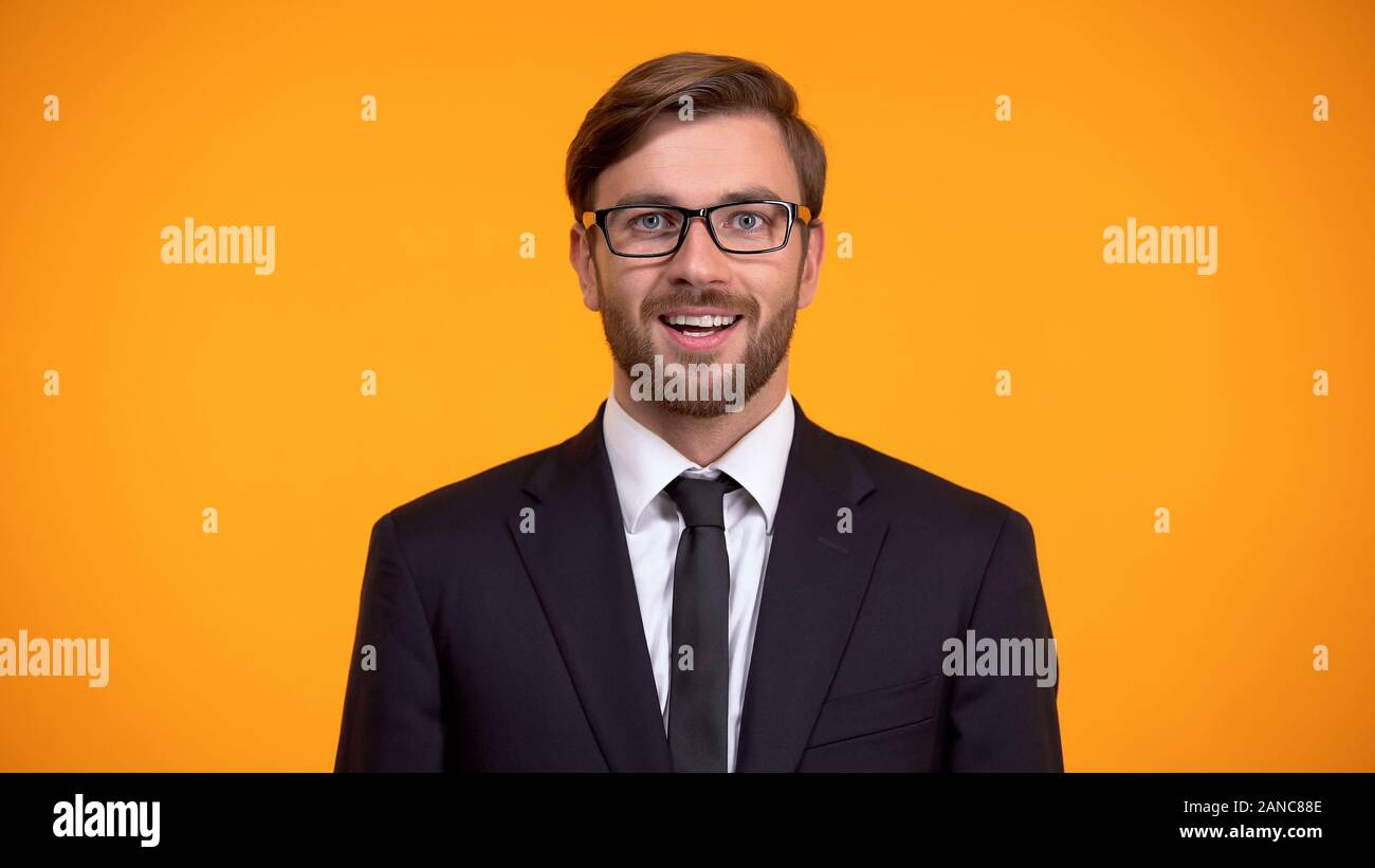 Happy businessman smiling to camera, good day and pleasant emotions ...