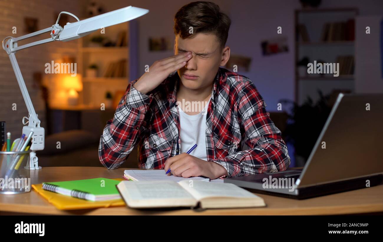 Sleepy student cant concentrate in homework preparation, lot of hard ...
