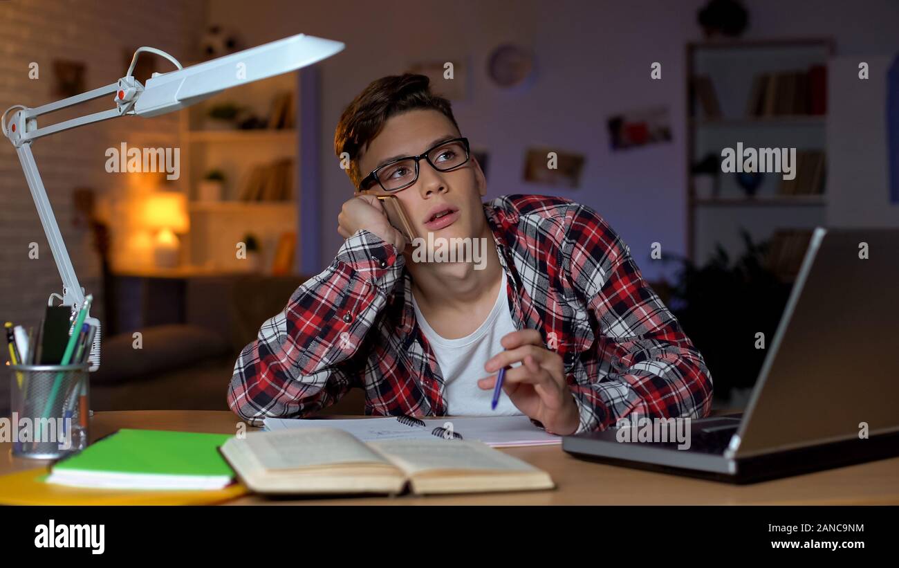 Teenager phone instead of studying hi-res stock photography and images ...