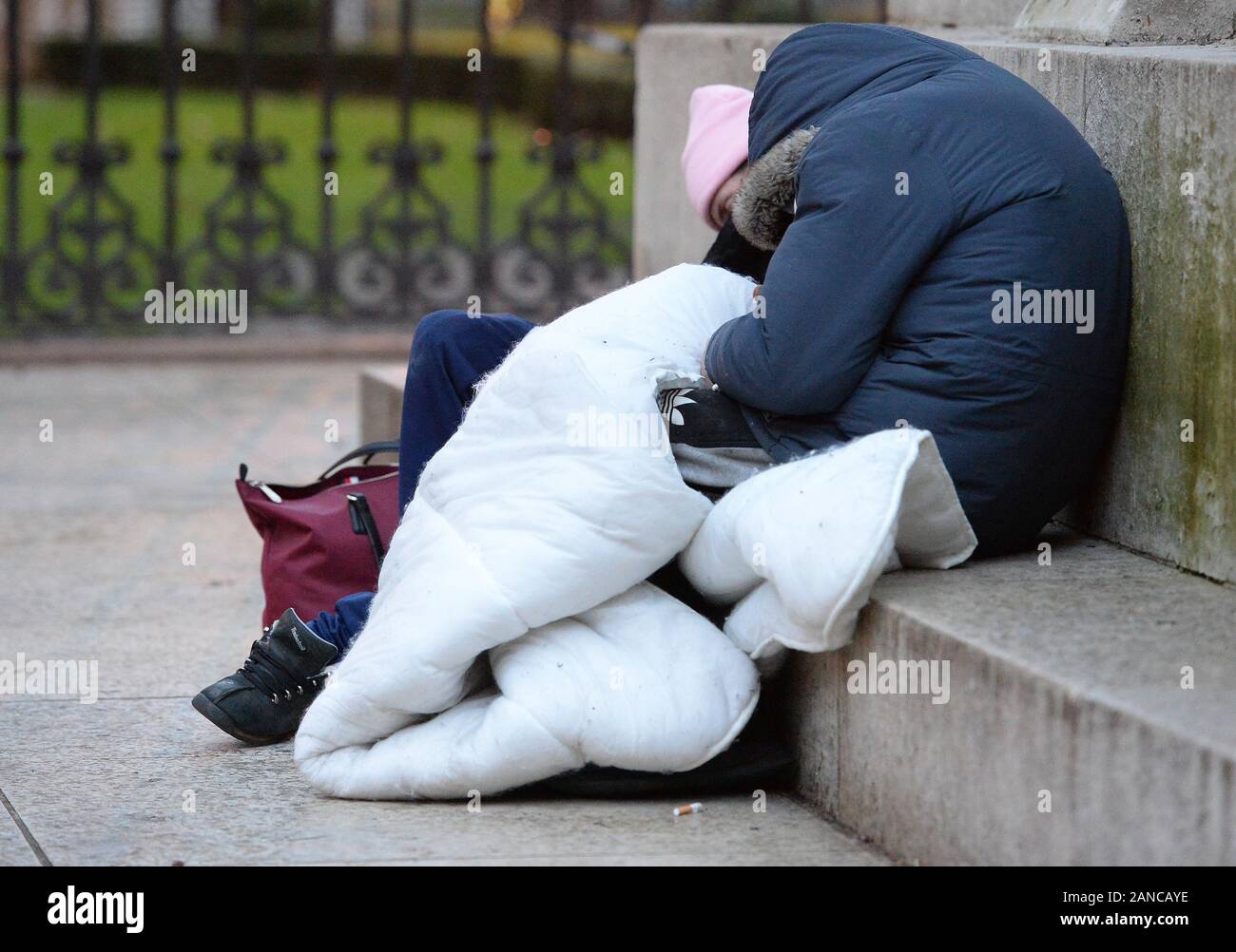 Homeless people sleep on the plinth of the Ferdinand Foch Equestrian ...