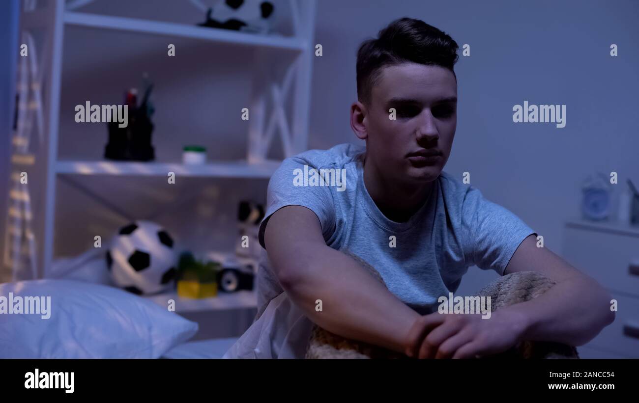 Boy lying bed thinking hi-res stock photography and images - Alamy