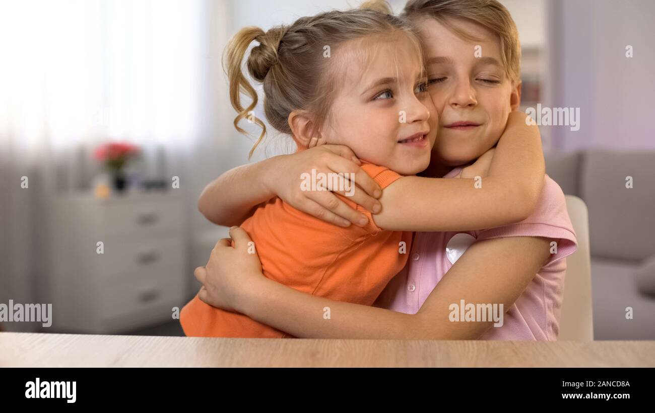 Boy and girl embracing, good friends, first love relationship ...