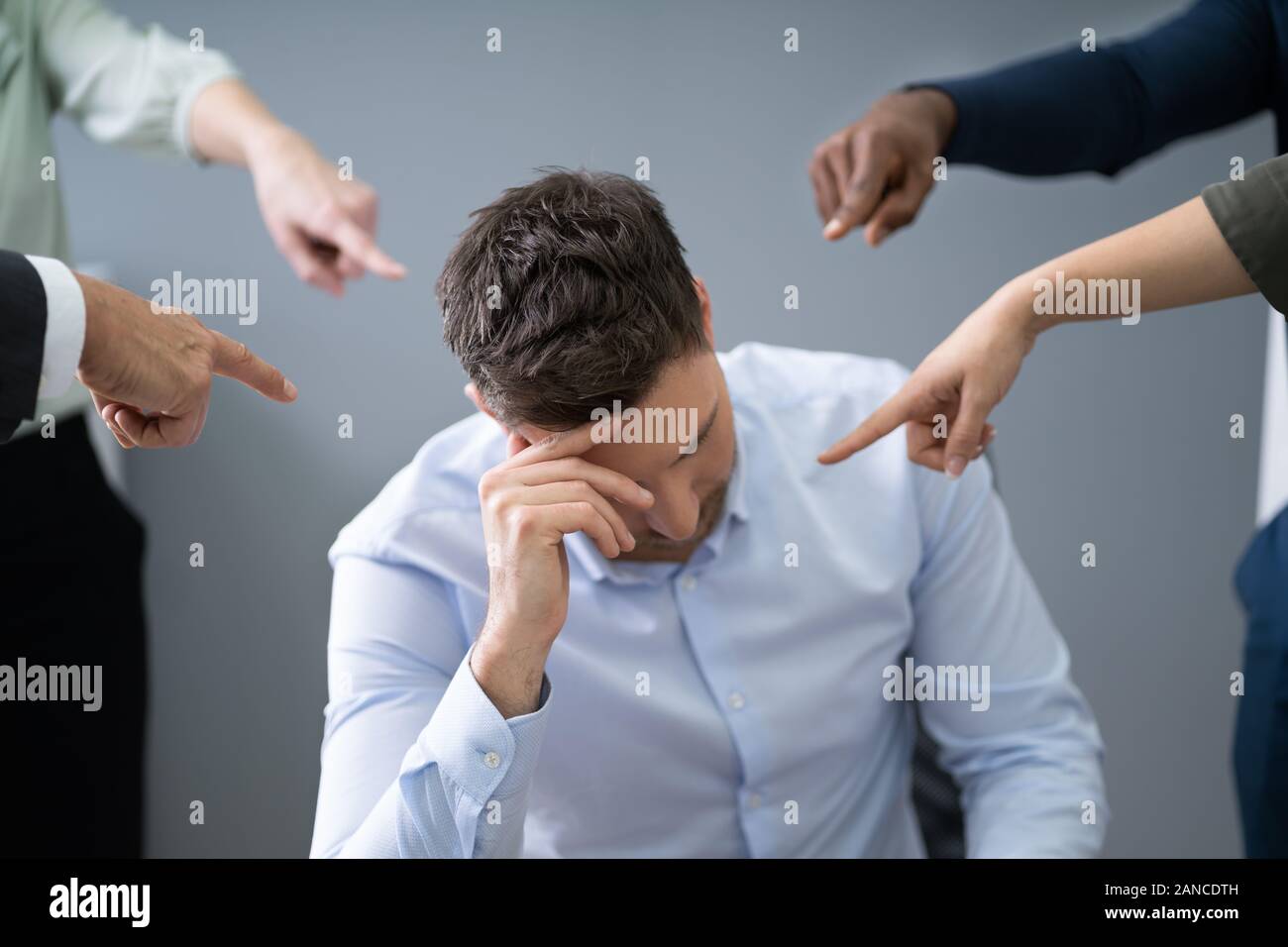 Many Hands Pointing The Stress Businessman At The Workplace Stock Photo ...
