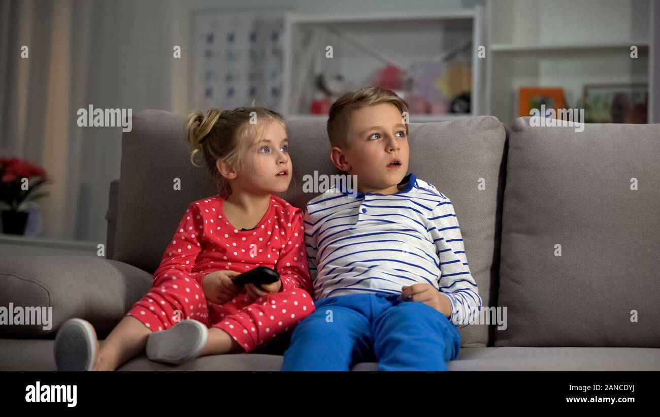 Boy watching television night hi-res stock photography and images - Alamy