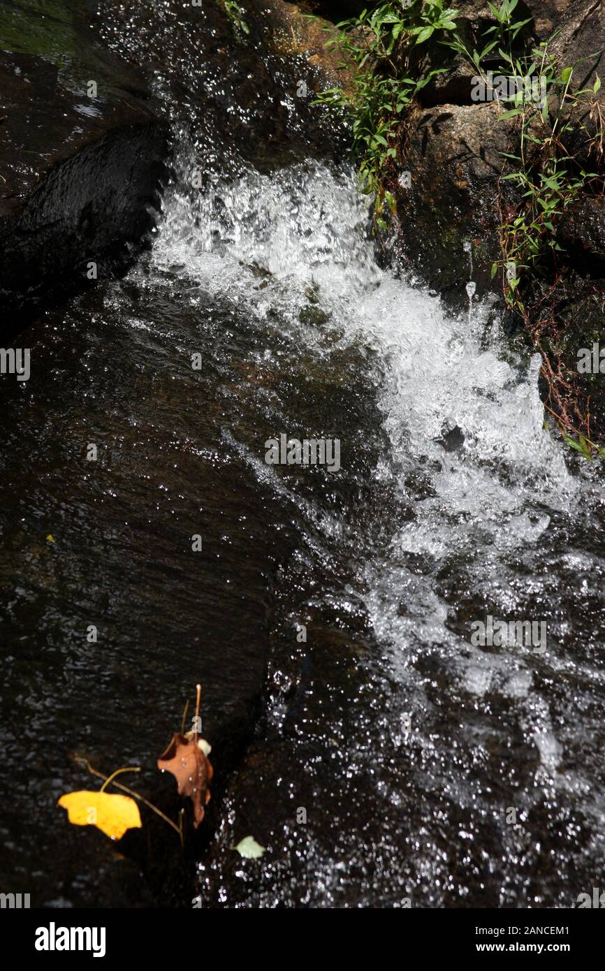 Water flowing down rocks hi-res stock photography and images - Alamy