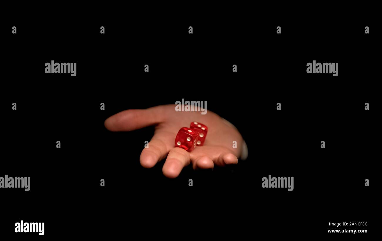 Hand holding pair dice hi-res stock photography and images - Alamy