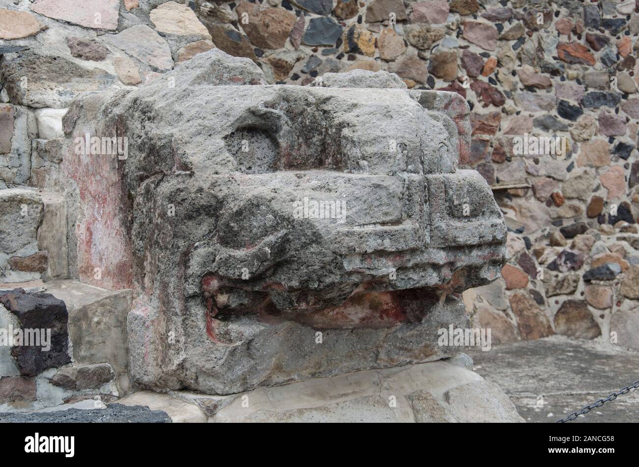 Stone head in the Temple of the Feathered Serpent, in Teotihuacan, a ...