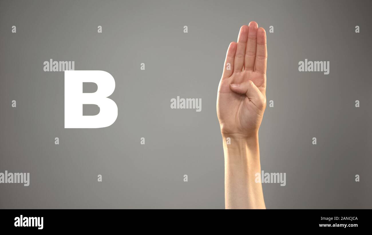 Letter B in sign language, hand on background, communication for deaf ...
