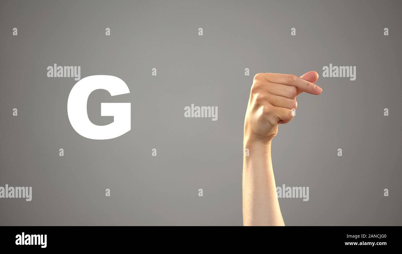 Letter G in sign language, hand on background, communication for deaf ...