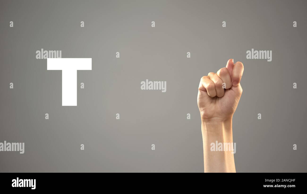 Letter T in sign language, hand on background, communication for deaf ...