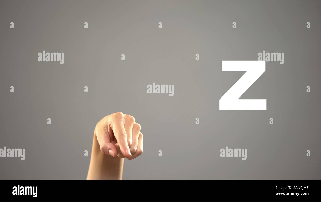 Letter Z in sign language, hand on background, communication for deaf ...