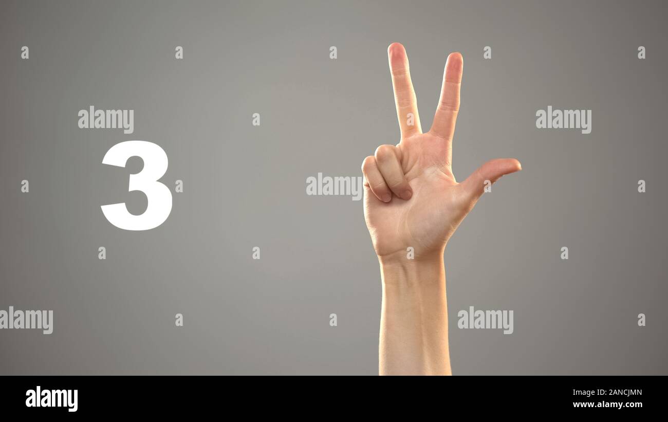 Hand signing 3 in asl, number on background, sign language tutorial for ...