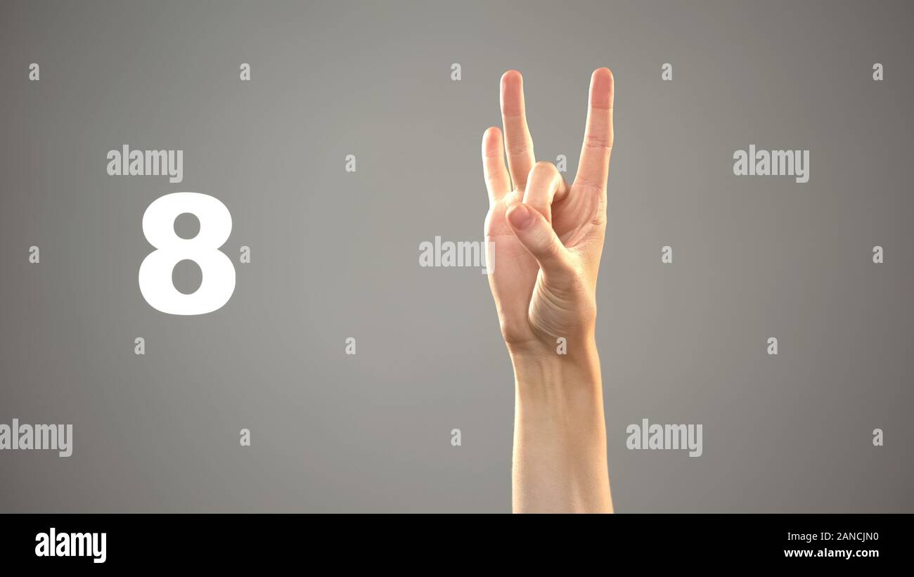 Hand signing 8 in asl, number on background, sign language tutorial for ...