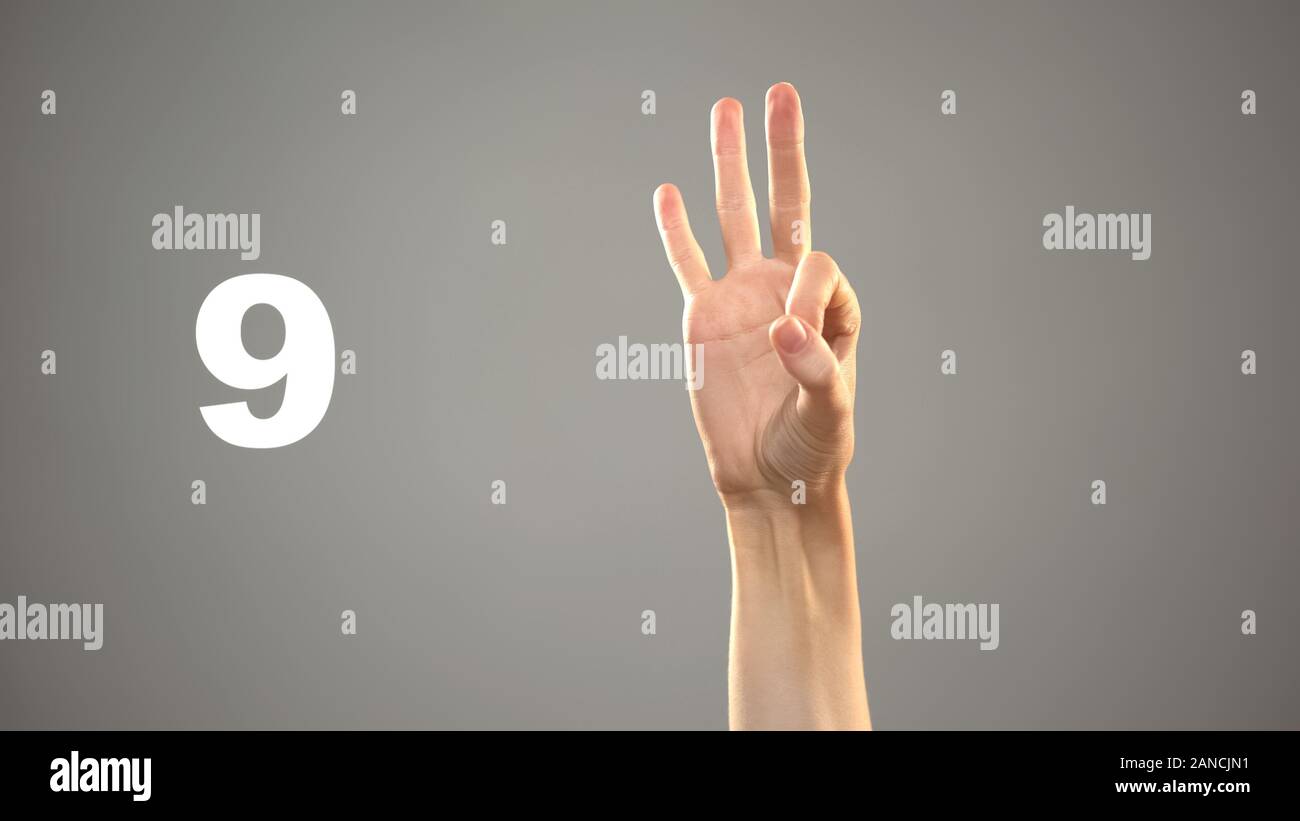 Hand signing 9 in asl, number on background, sign language tutorial for ...