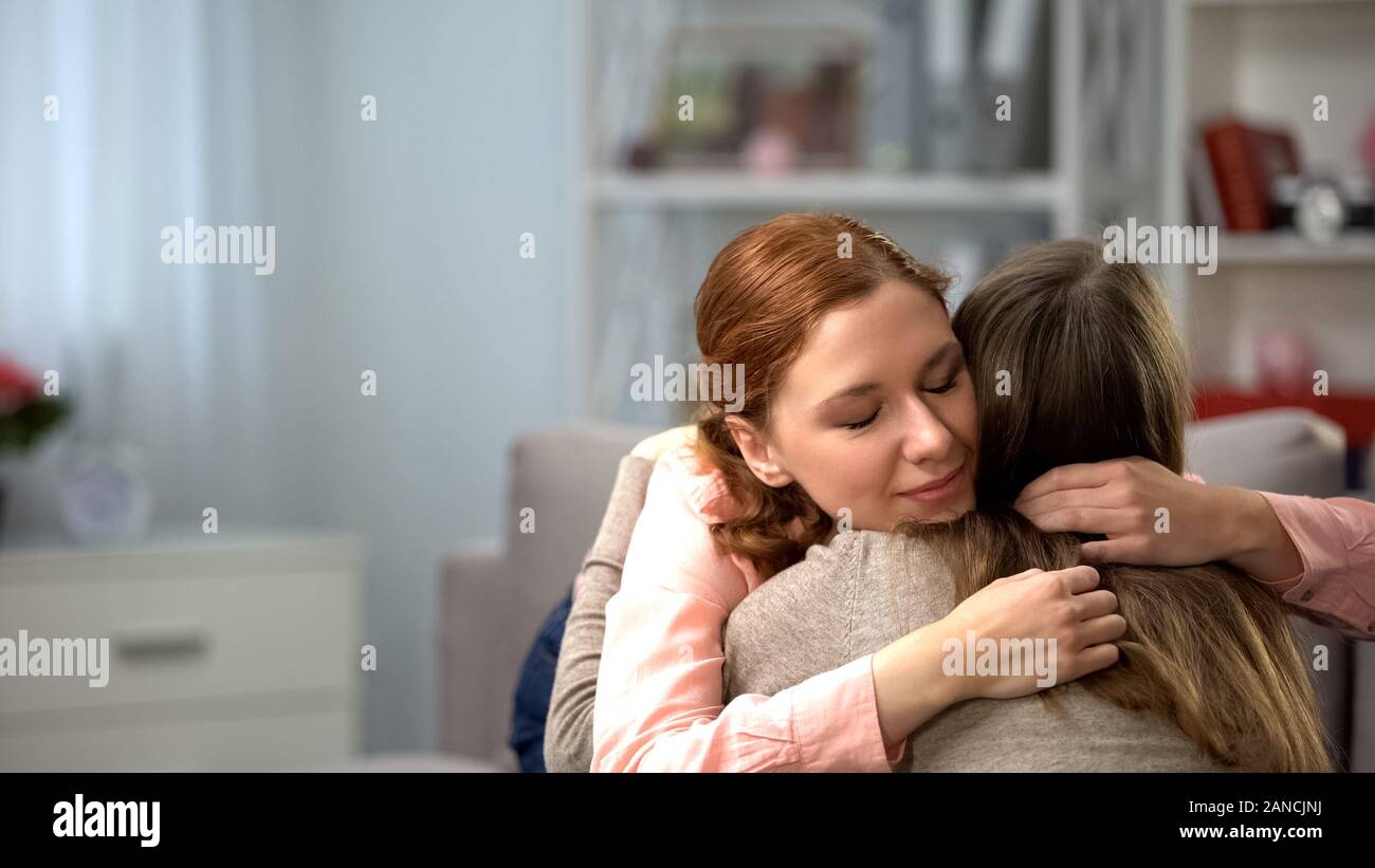 Two women comforting friend emotion hi-res stock photography and images ...