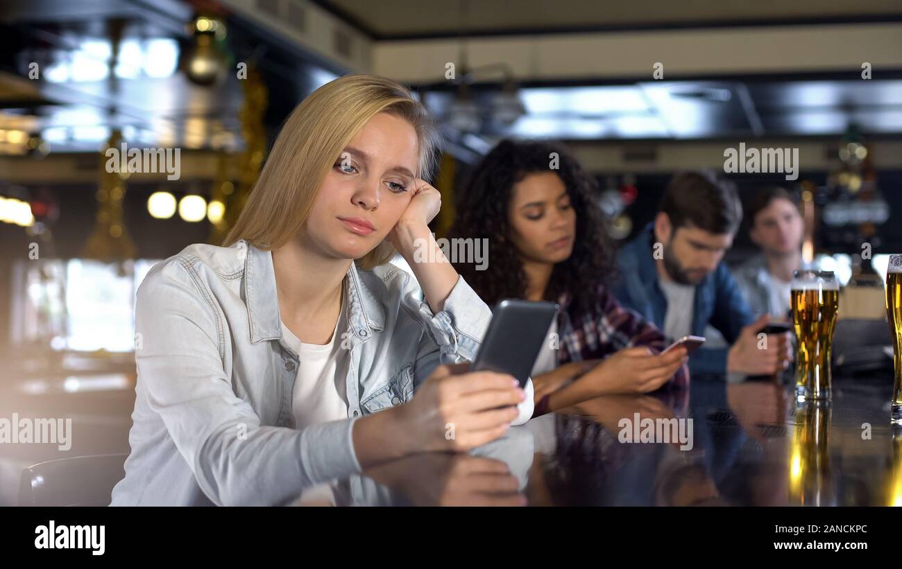 Women using mobile phones ignoring hi-res stock photography and images ...