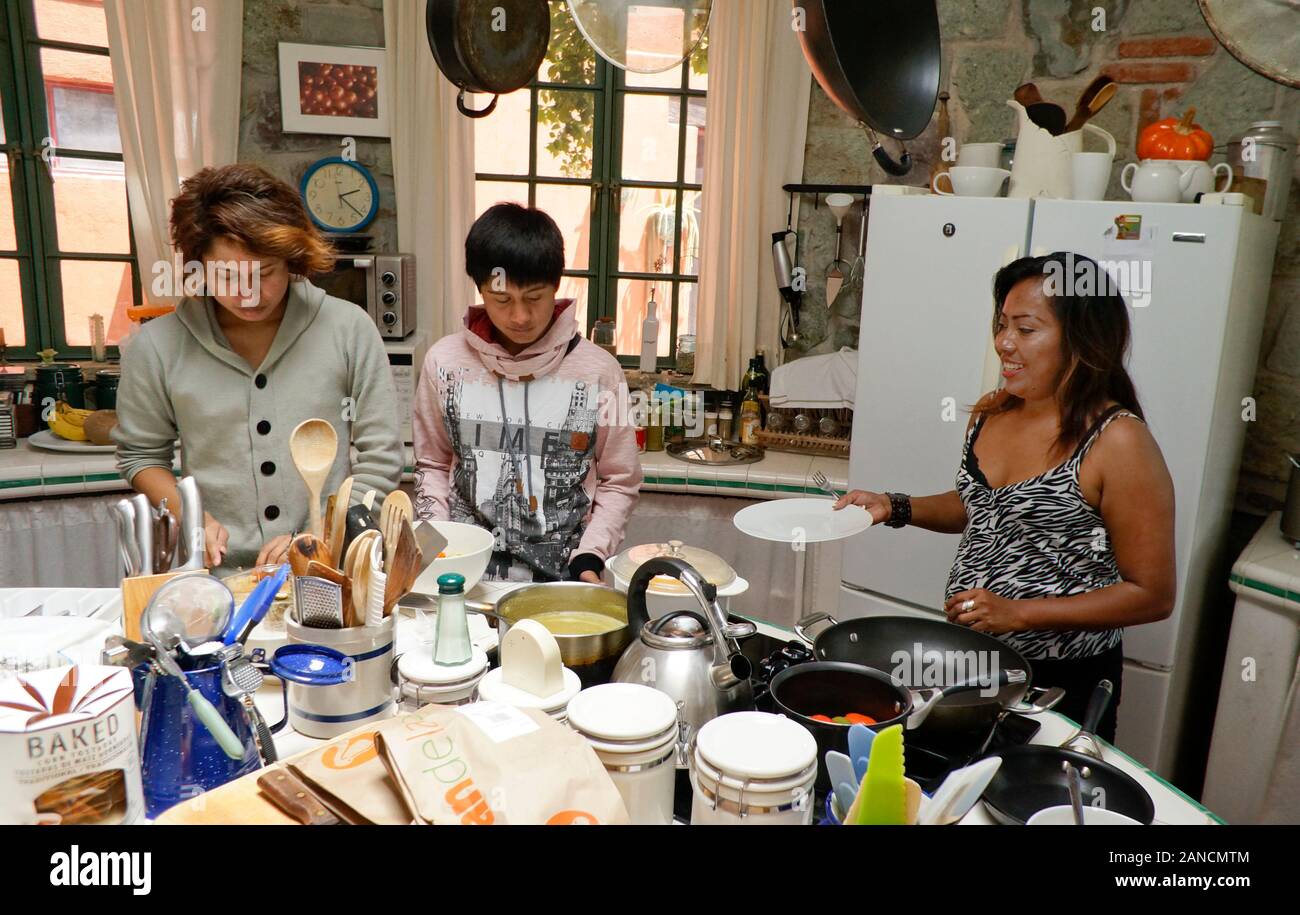 Mexican family cooking in San Miguel de Allende, Mexico. Mother and ...