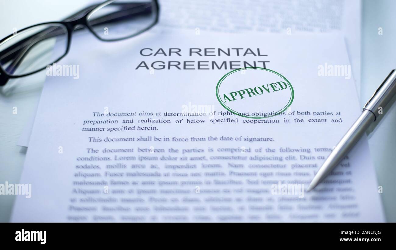 Car rental agreement approved, seal stamped on official document ...