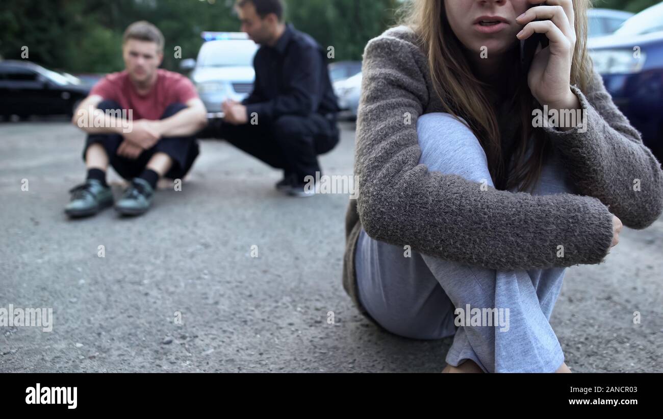 Interrogating witness at crime scene hi-res stock photography and ...