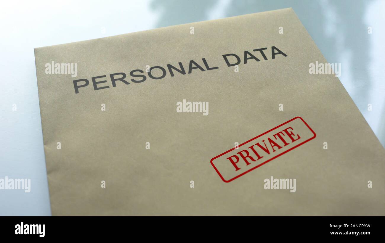 Personal data private, seal stamped on folder with important documents ...