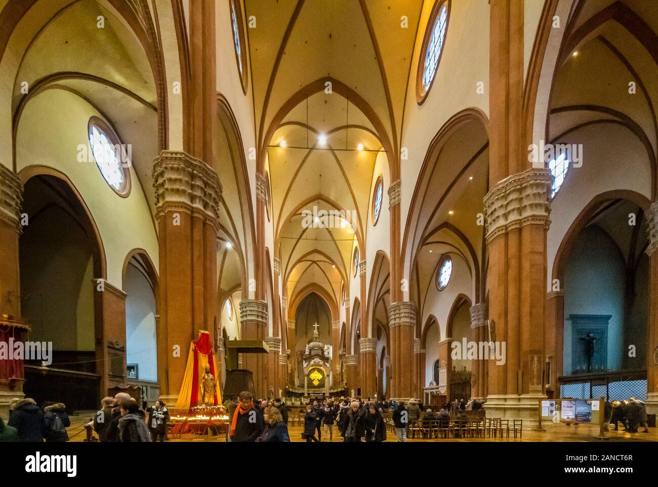BOLOGNA, ITALY - DECEMBER 29, 2019: tourists visiting the Basilica of ...