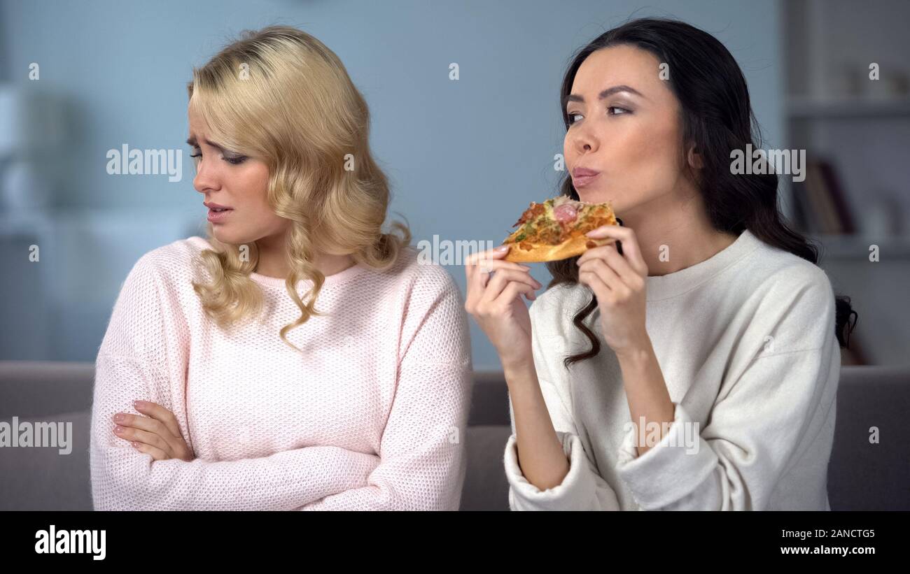 Fastfood girl woman pizza junk food hi-res stock photography and images ...