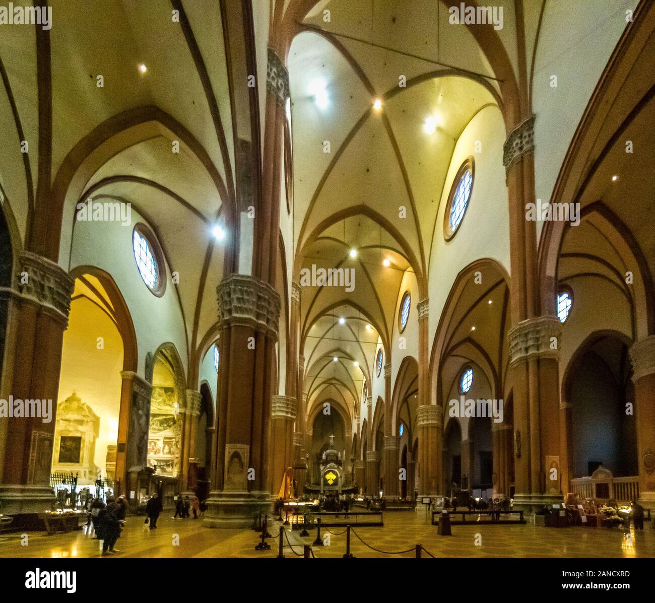 BOLOGNA, ITALY - DECEMBER 29, 2019: tourists visiting the Basilica of ...