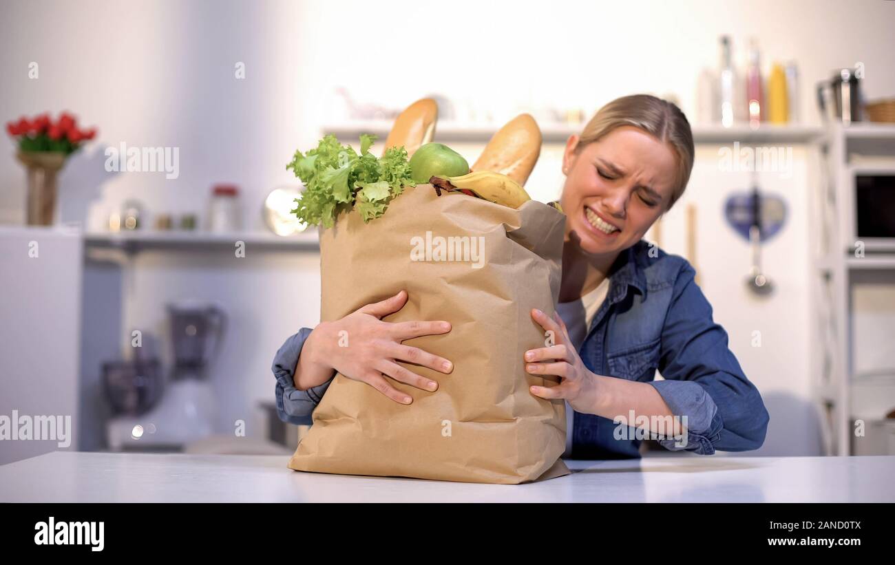 Carrying heavy groceries hi-res stock photography and images - Alamy